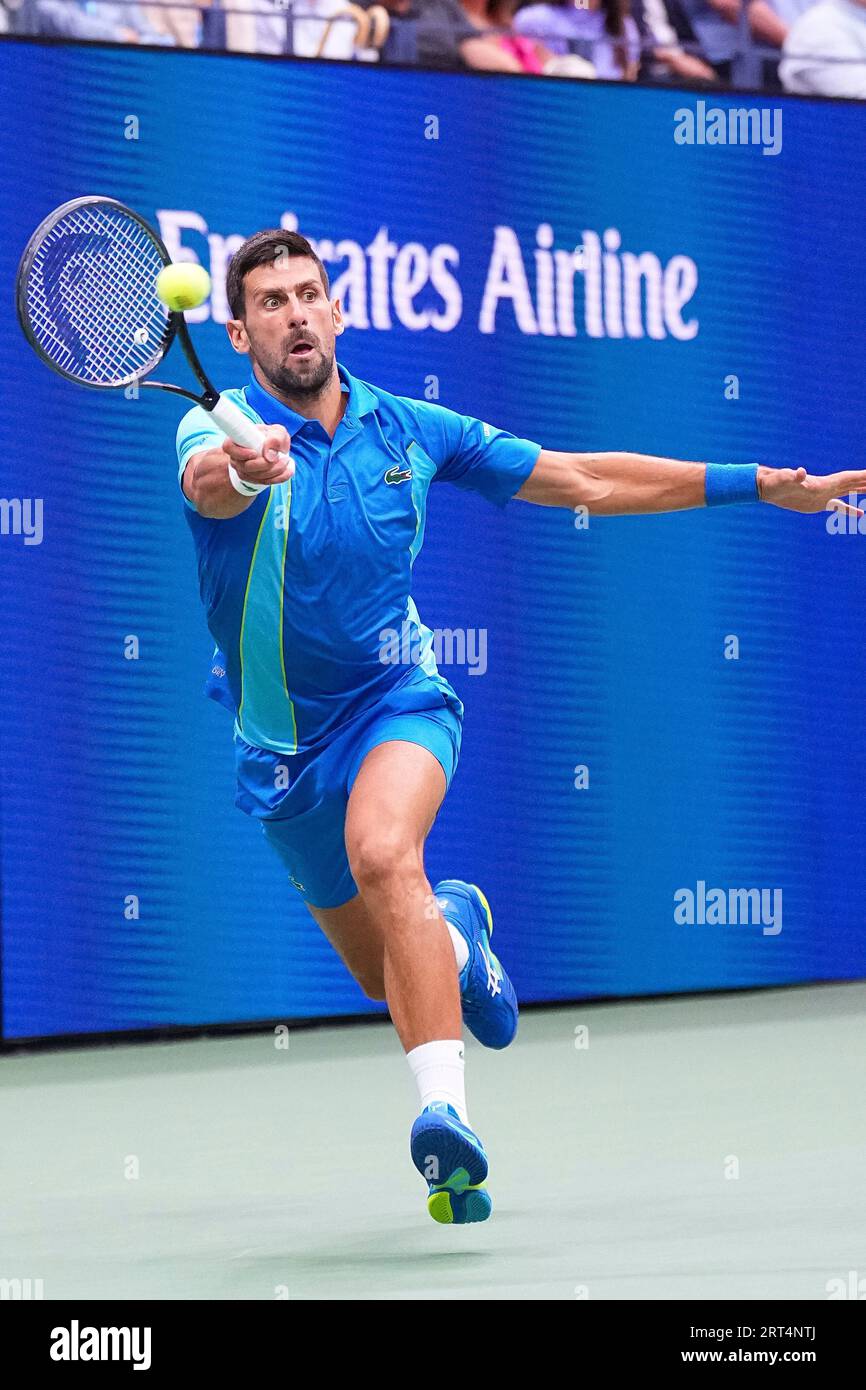 Novak Djokovic hits a forehand during a men's singles championship ...