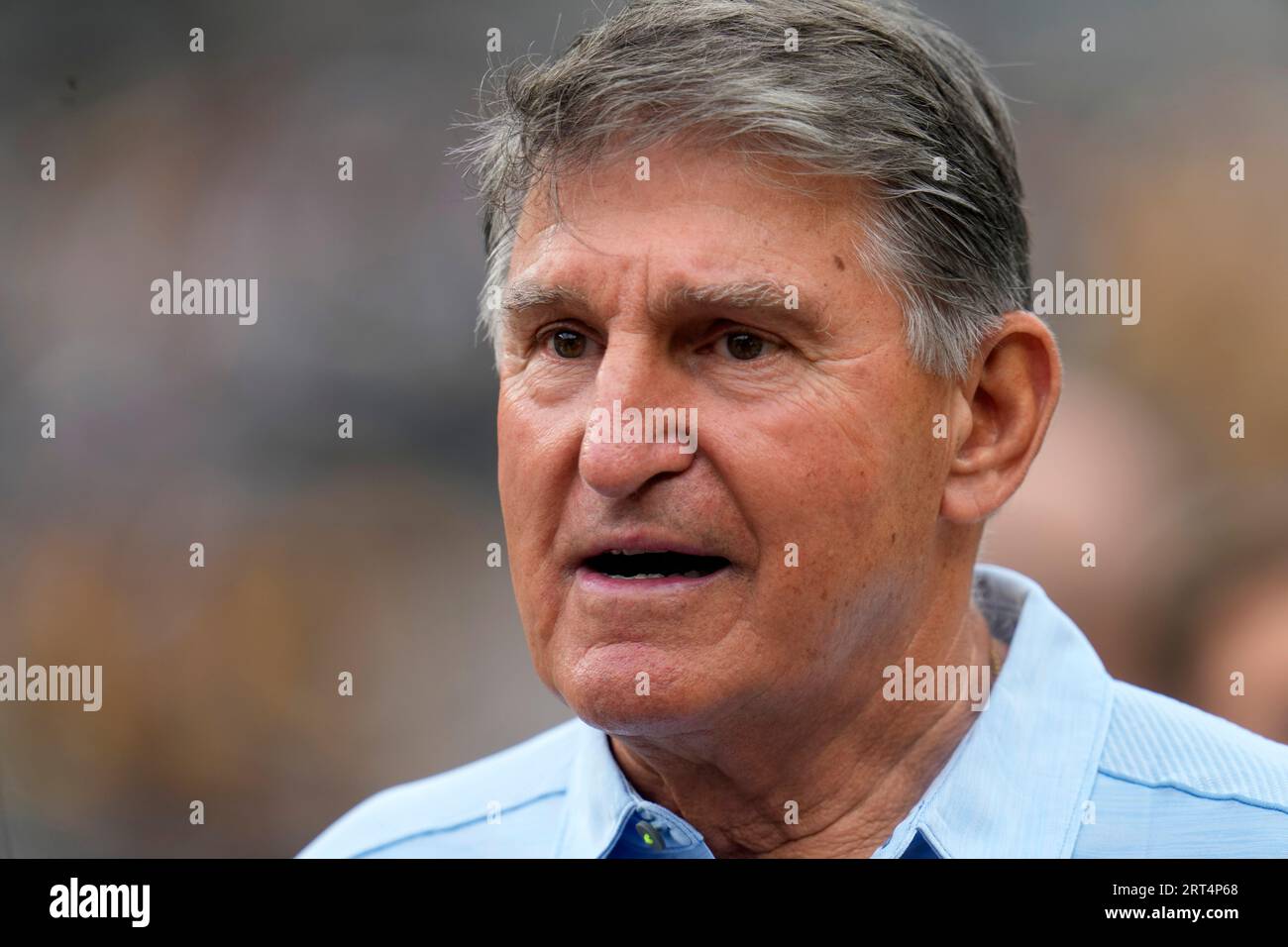 U.S. Senator Joe Manchin, D-W.Va., visits the sidelines at Acrisure ...