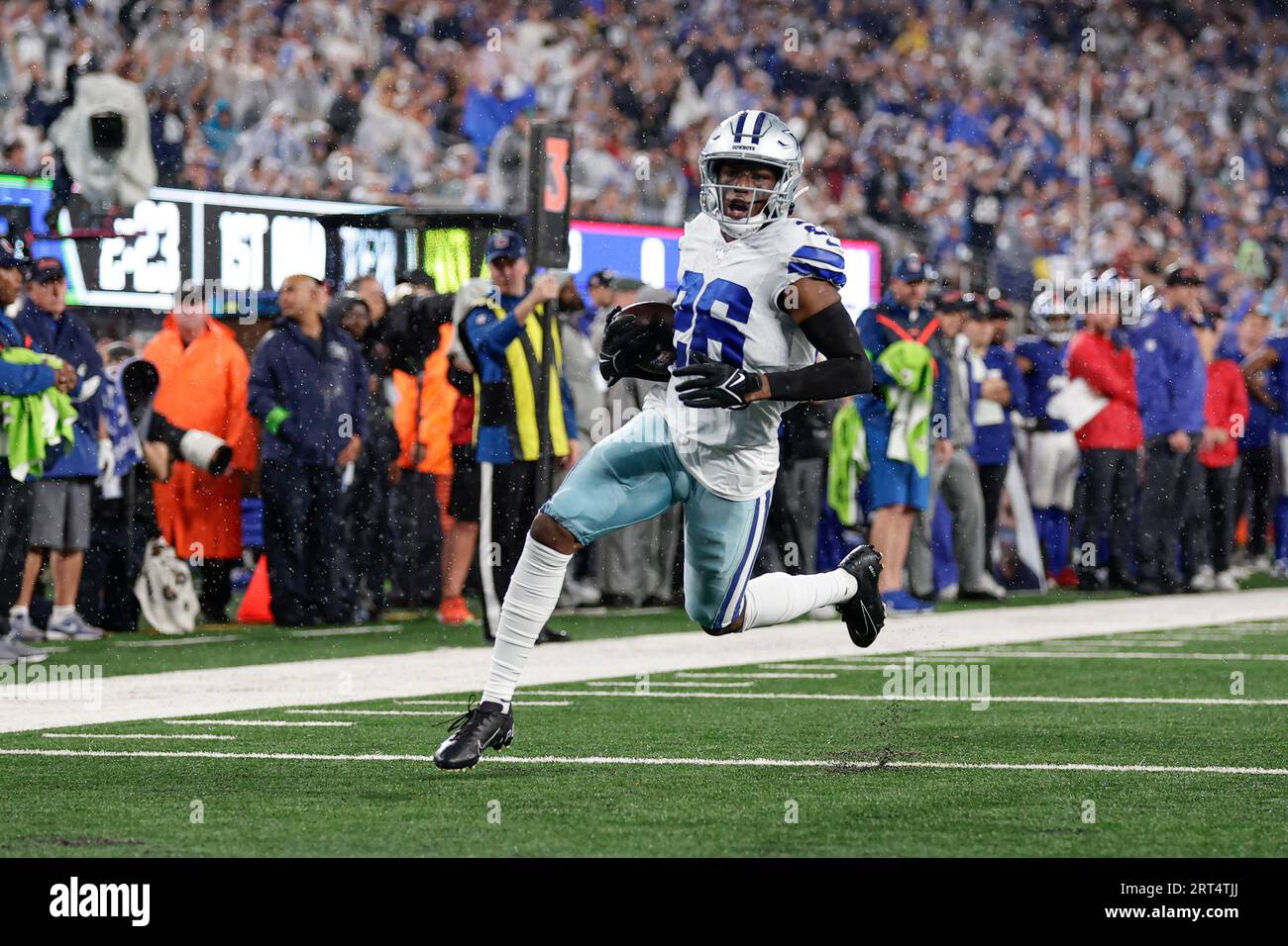 Dallas Cowboys' DaRon Bland runs for a touchdown after intercepting the ...