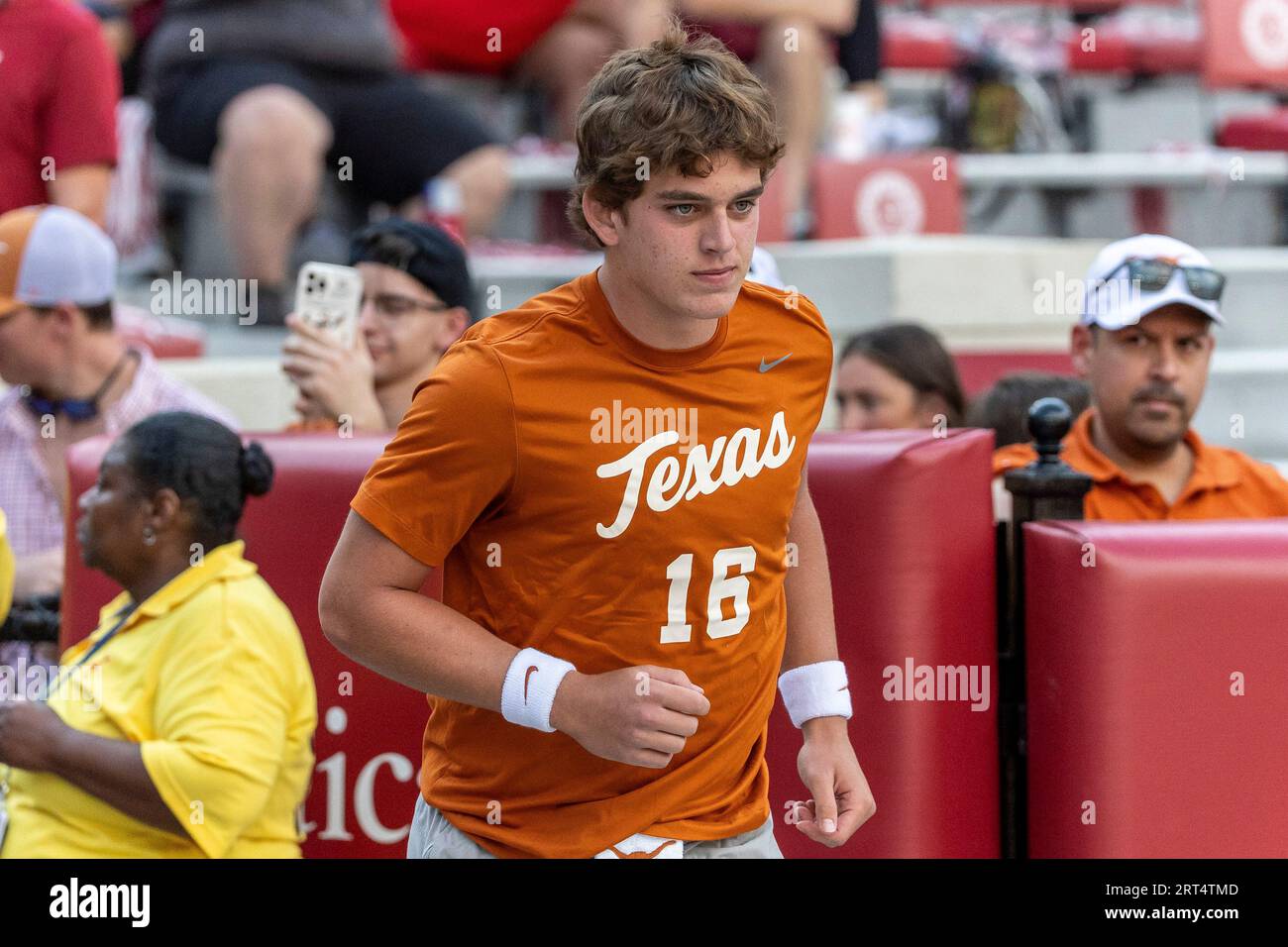 Texas quarterback Arch Manning (16) jogs onto the field for warm-ups ...