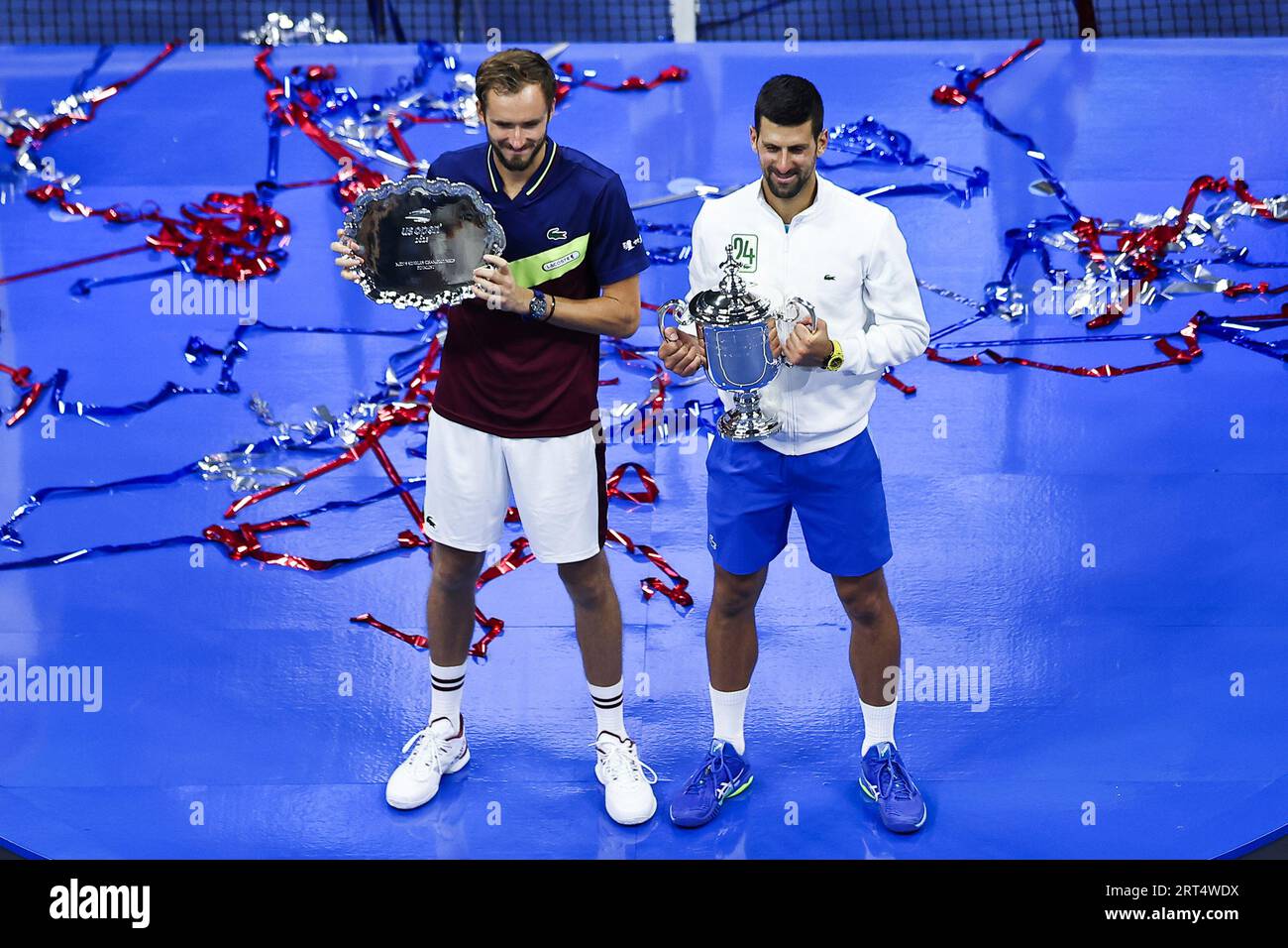 Daniil Medvedev and Novak Djokovic pose for a photo during a trophy ...