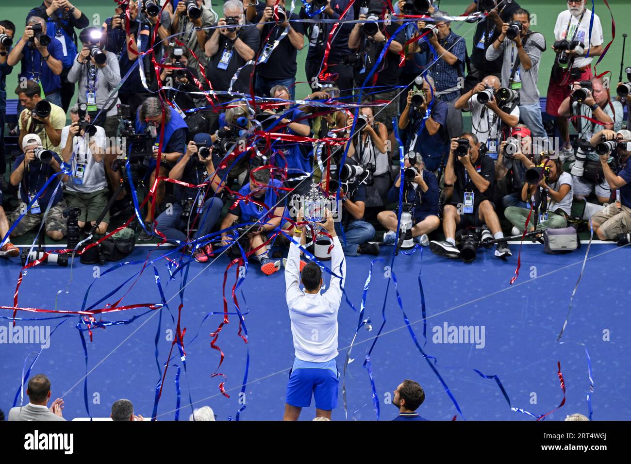 Novak Djokovic poses for a photo with the trophy after winning the men ...