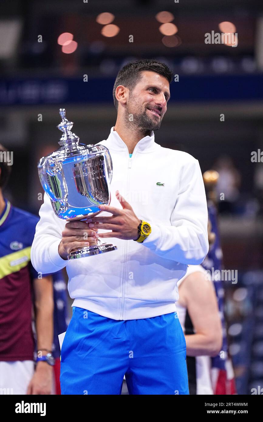 Novak Djokovic holds the trophy after winning a men's singles ...