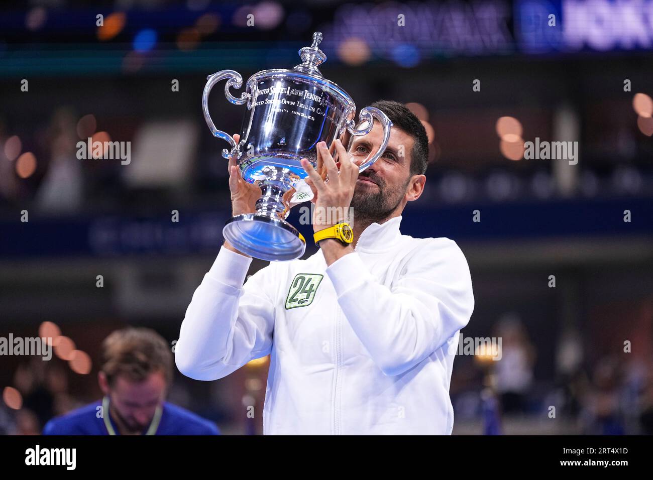 Novak Djokovic holds the trophy after winning a men's singles ...