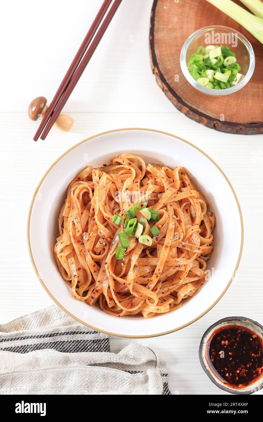 Chinese Rice Noodle with Chilli Oil with Chopped Green Onion Topping ...