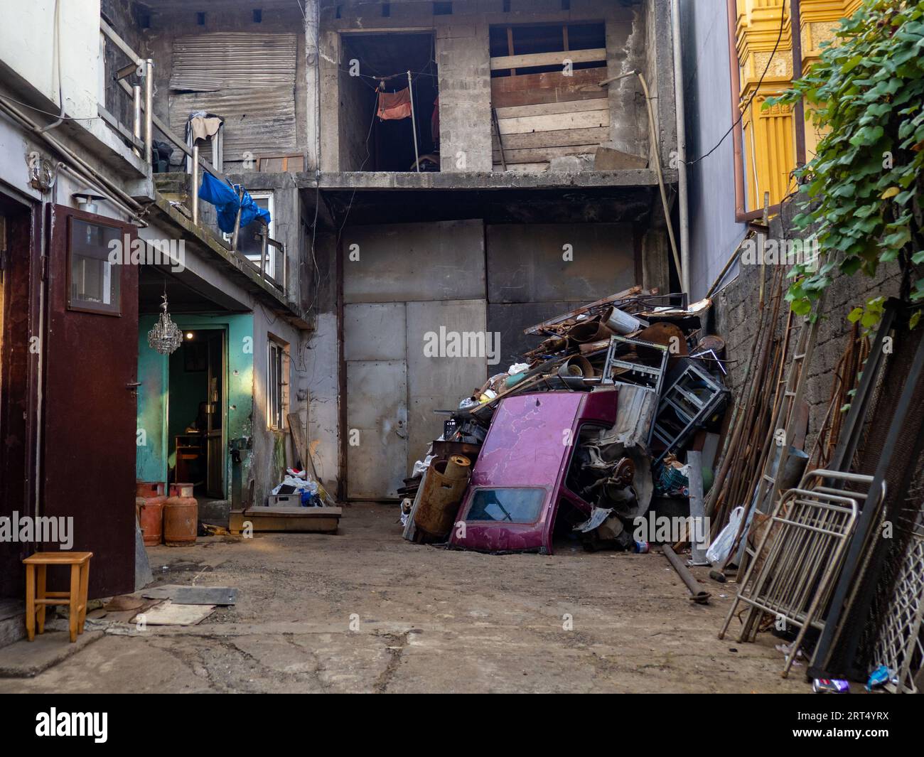 Private scrap yard. Rusty metal. Heaps of iron. Asian market. Business ...