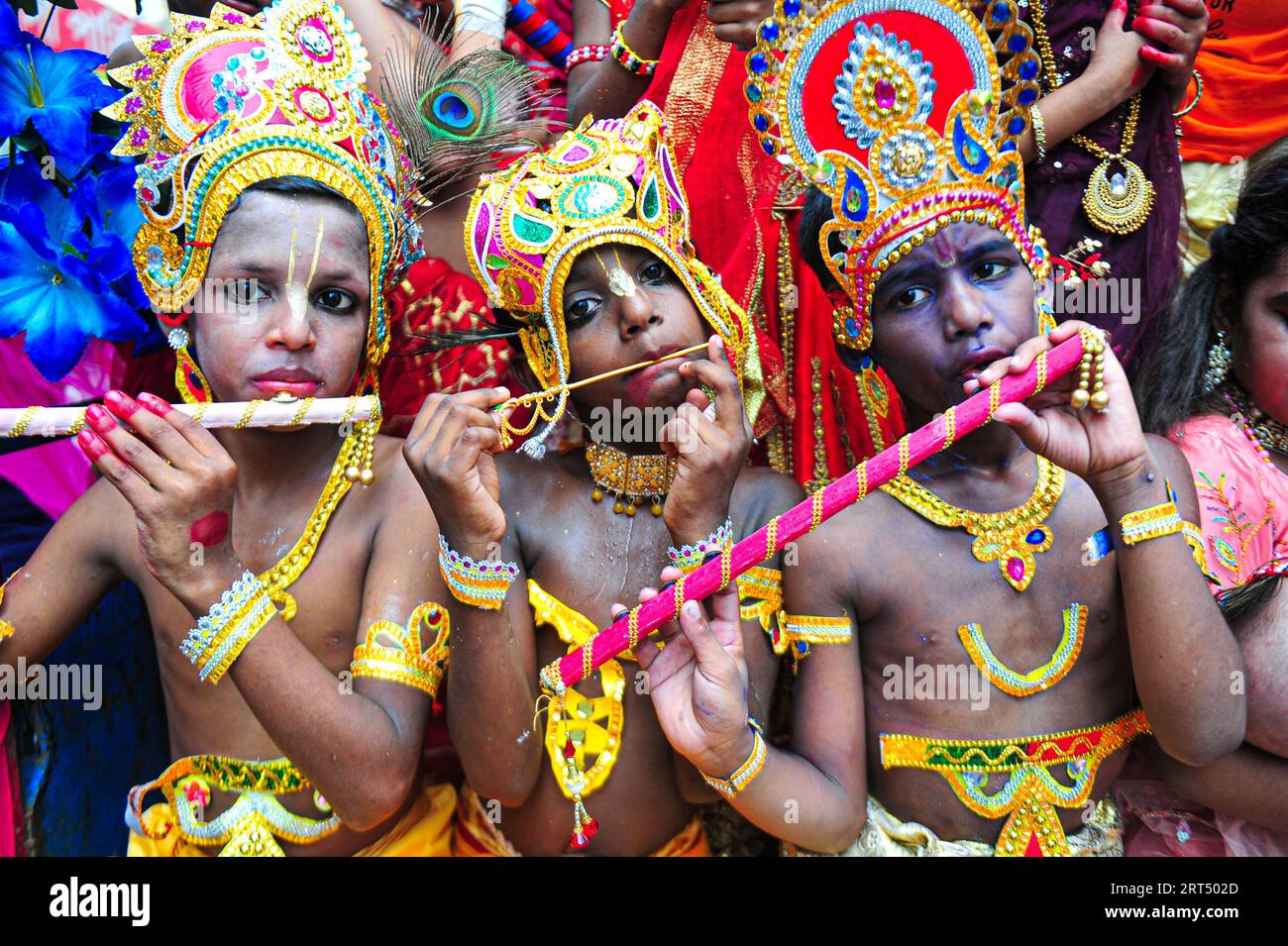 Young Children dress up as Radha and Krishna during the colorful rally ...