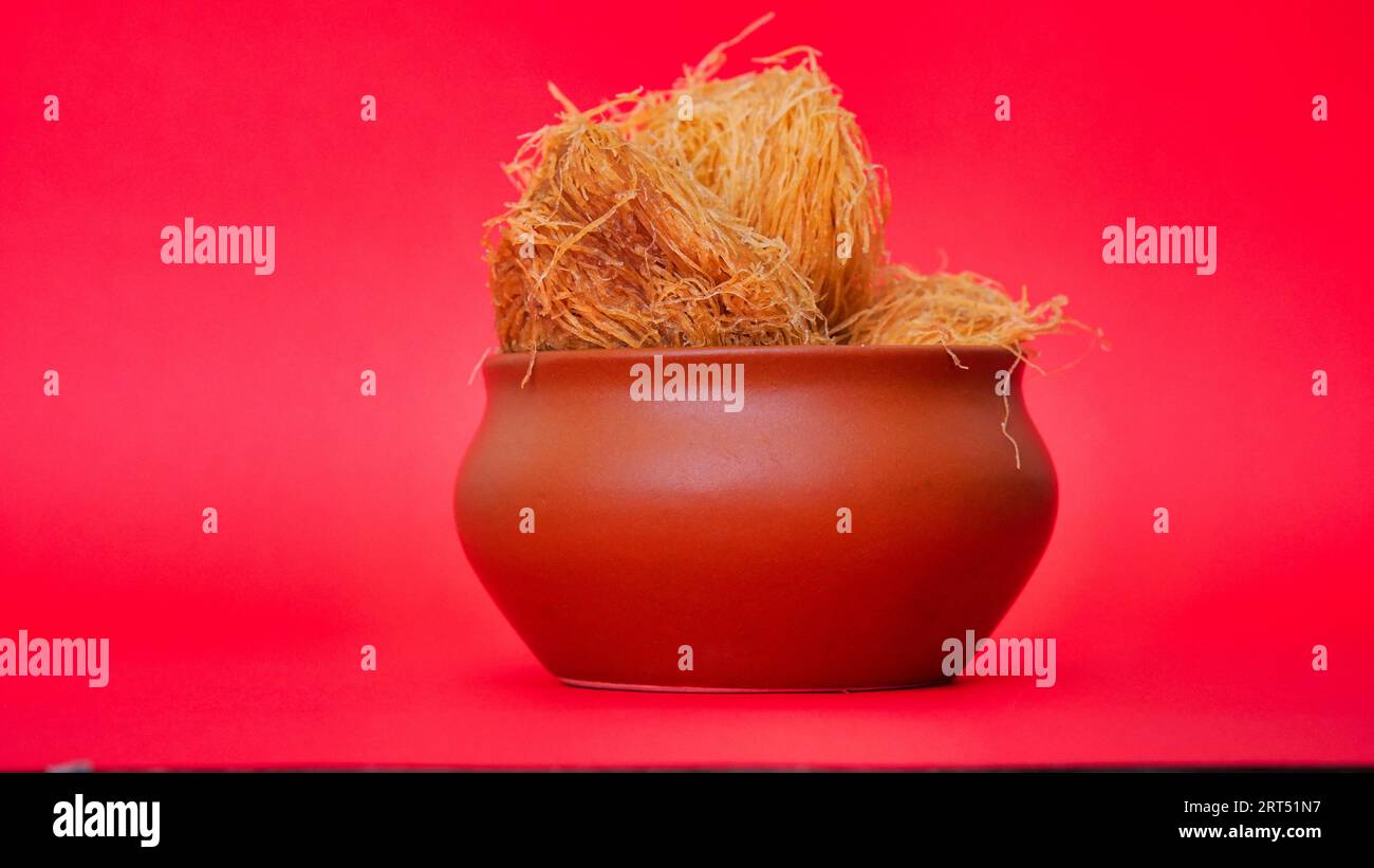 Indian Rajasthani crunchy sweet dish called Ghevar or Ghewar is an made ...