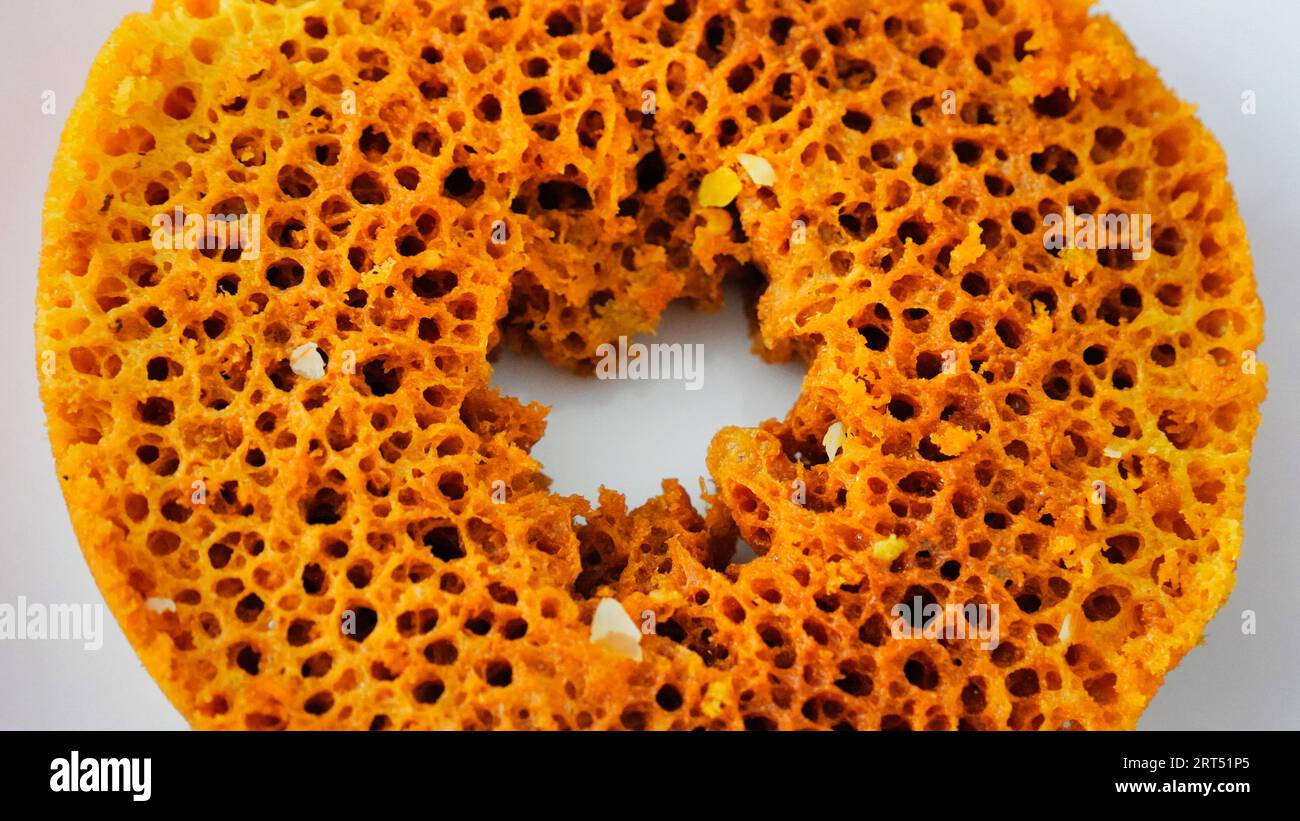 Indian Rajasthani crunchy sweet dish called Ghevar or Ghewar is an made ...