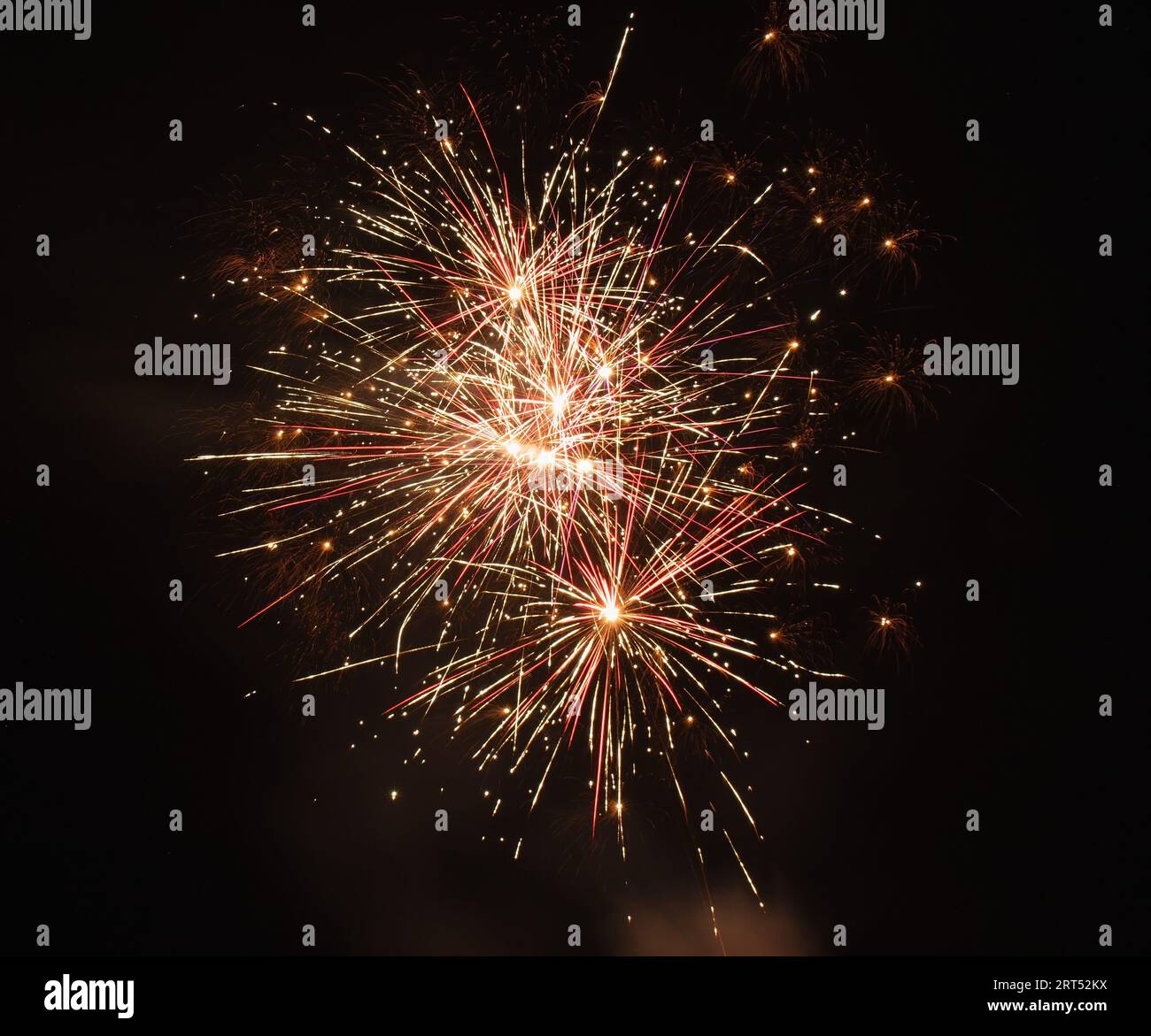 Pink white fireworks explode hi-res stock photography and images - Alamy