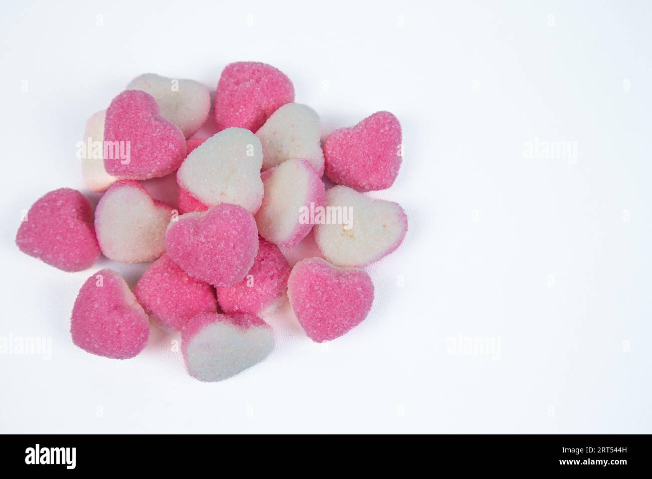 pile of heart shaped sugar Candies on white background Stock Photo - Alamy