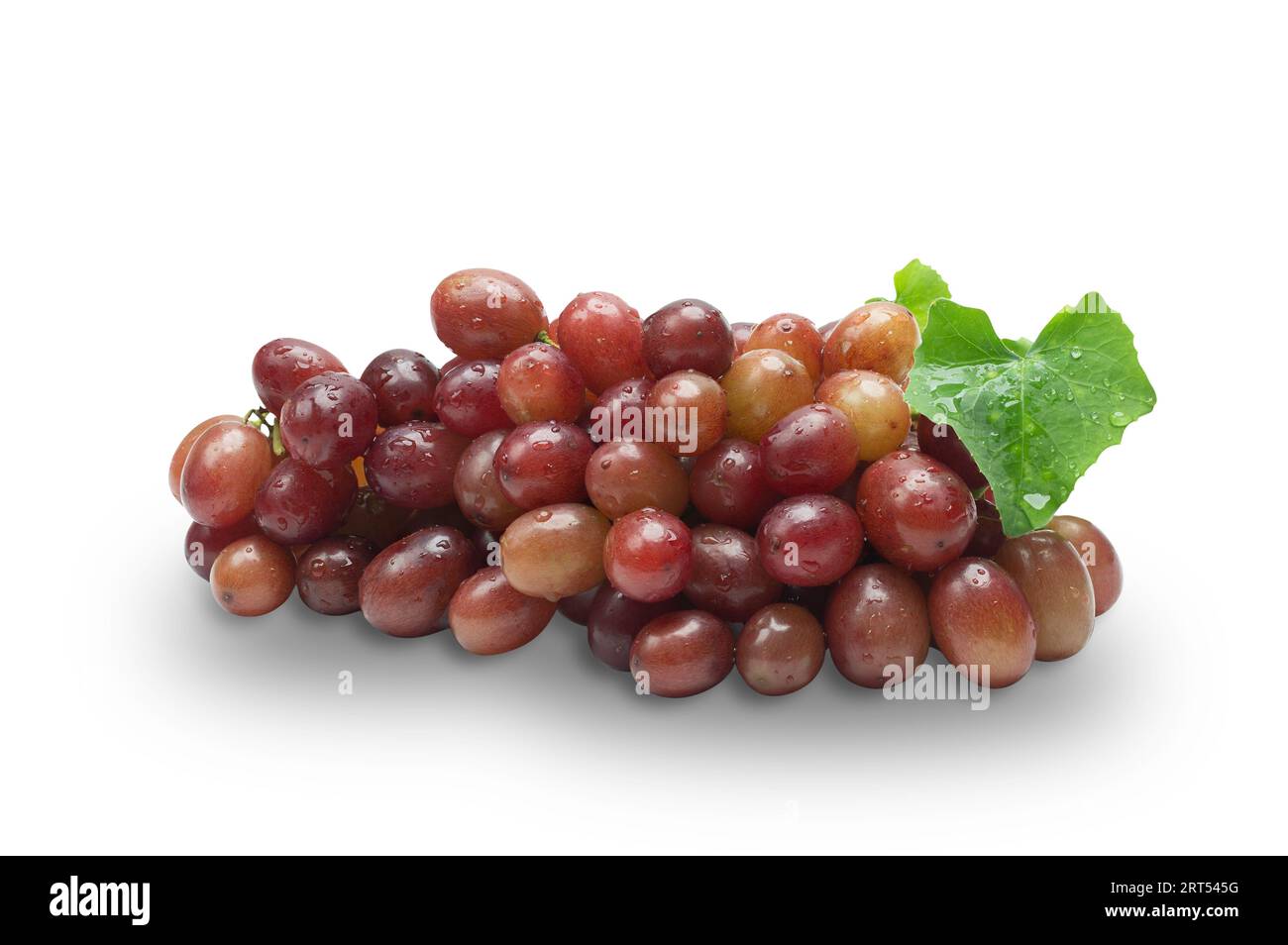 Large bunch fresh ripe organic red grape with leaves on white isolated ...