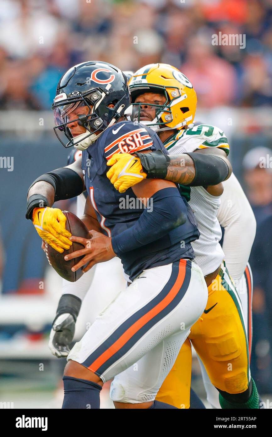 Chicago Bears quarterback Justin Fields (1) is tackled by Green Bay ...