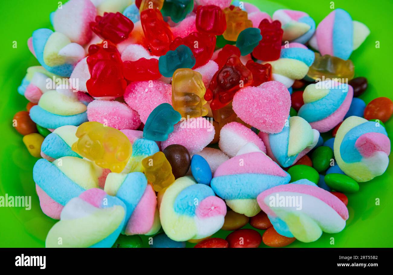 Piles of candy hi-res stock photography and images - Alamy