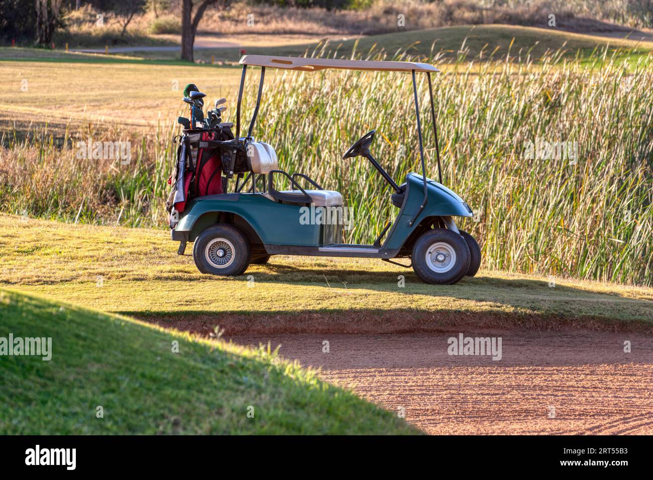 african golf courses, Gaborone Botswana, golf cart on the lawn with the ...