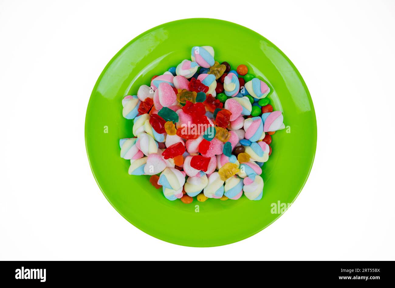 piles of various kinds of sweets and candies. Milk chocolate candy and ...