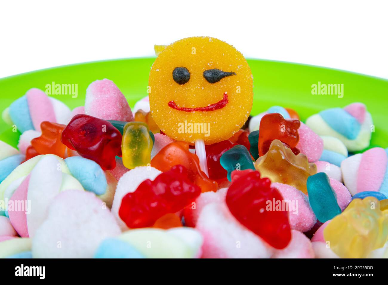 piles of various kinds of sweets and candies with a focus on the ...