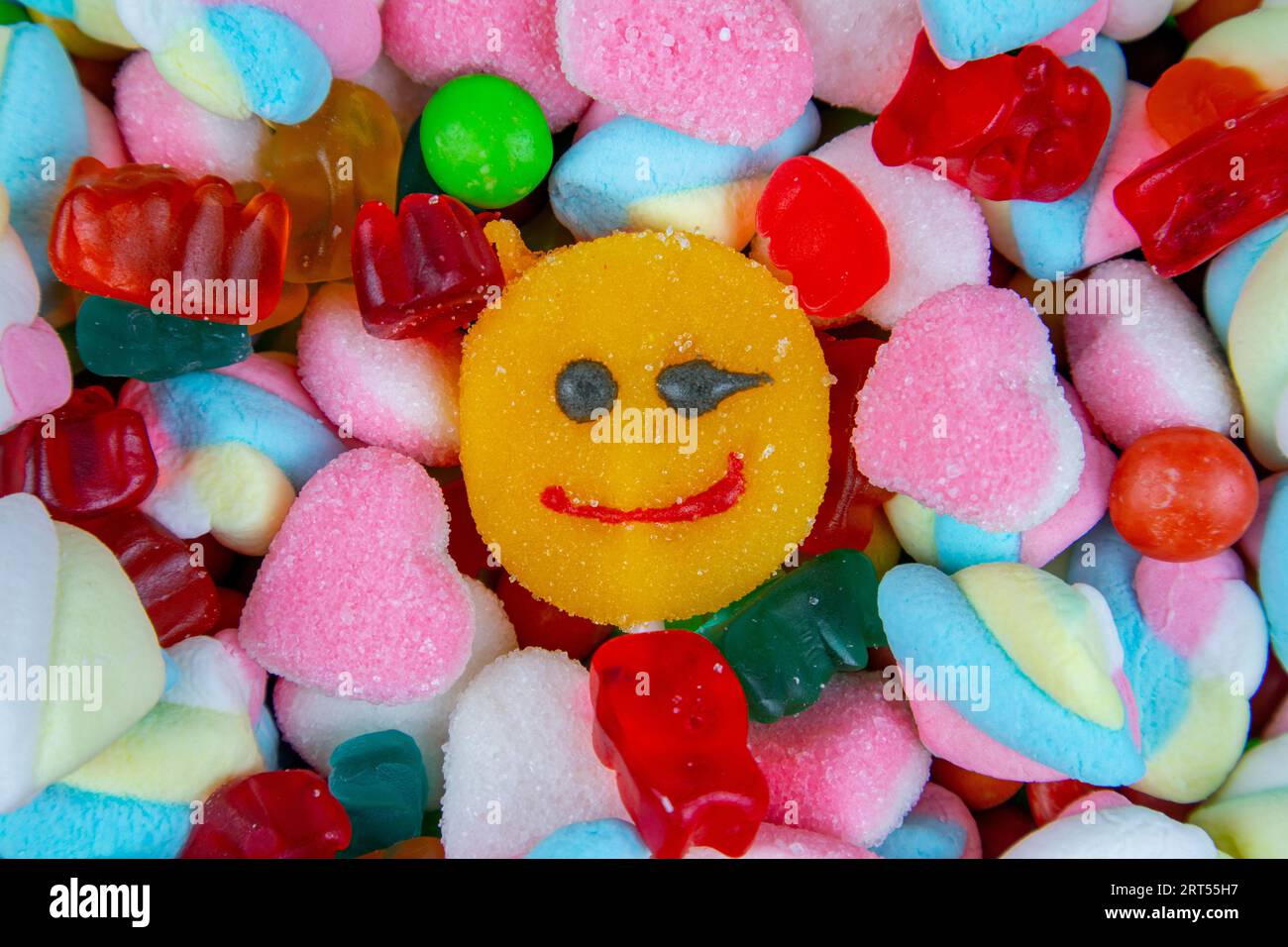 Piles Of Various Kinds Of Sweets And Candies With A Focus On The
