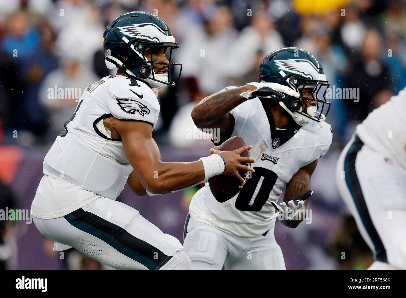 Philadelphia Eagles quarterback Jalen Hurts (1) fakes a handoff to ...
