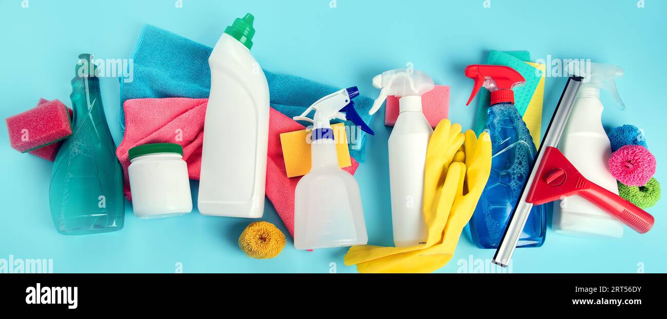 Cleaning supplies collection on blue background. Housework, cleaning ...