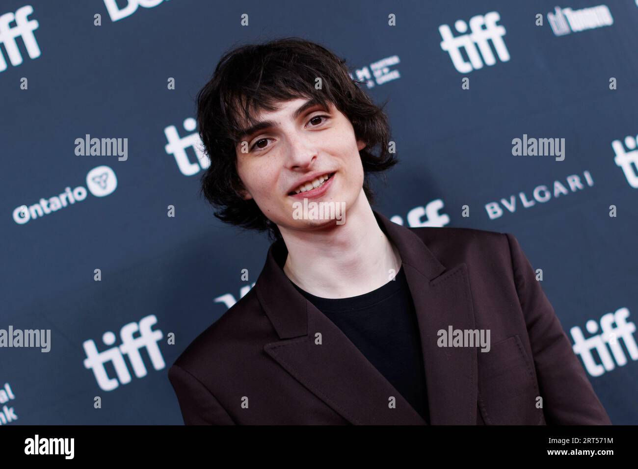 Director Finn Wolfhard arrives on the red carpet ahead of the premiere ...