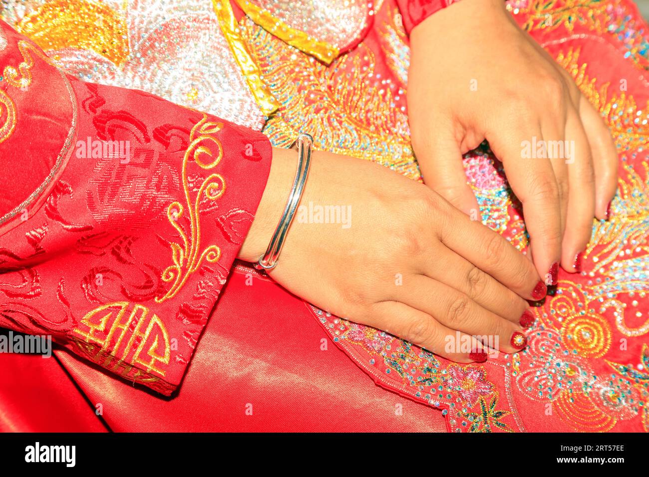 Chinese brides and embroidered costumes Stock Photo - Alamy