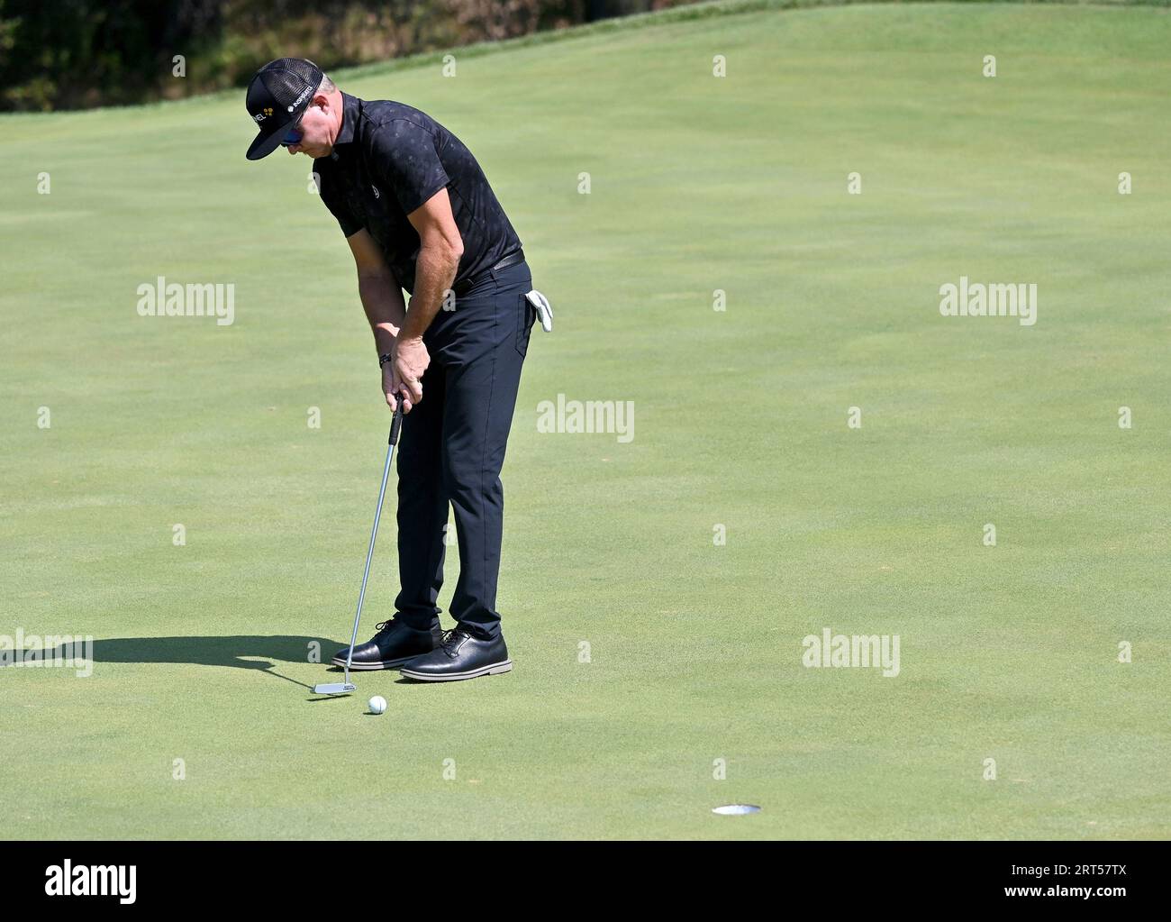 JENNINGS, MO - SEPTEMBER 10: Golfer Brian Gay putts on the #2 green ...