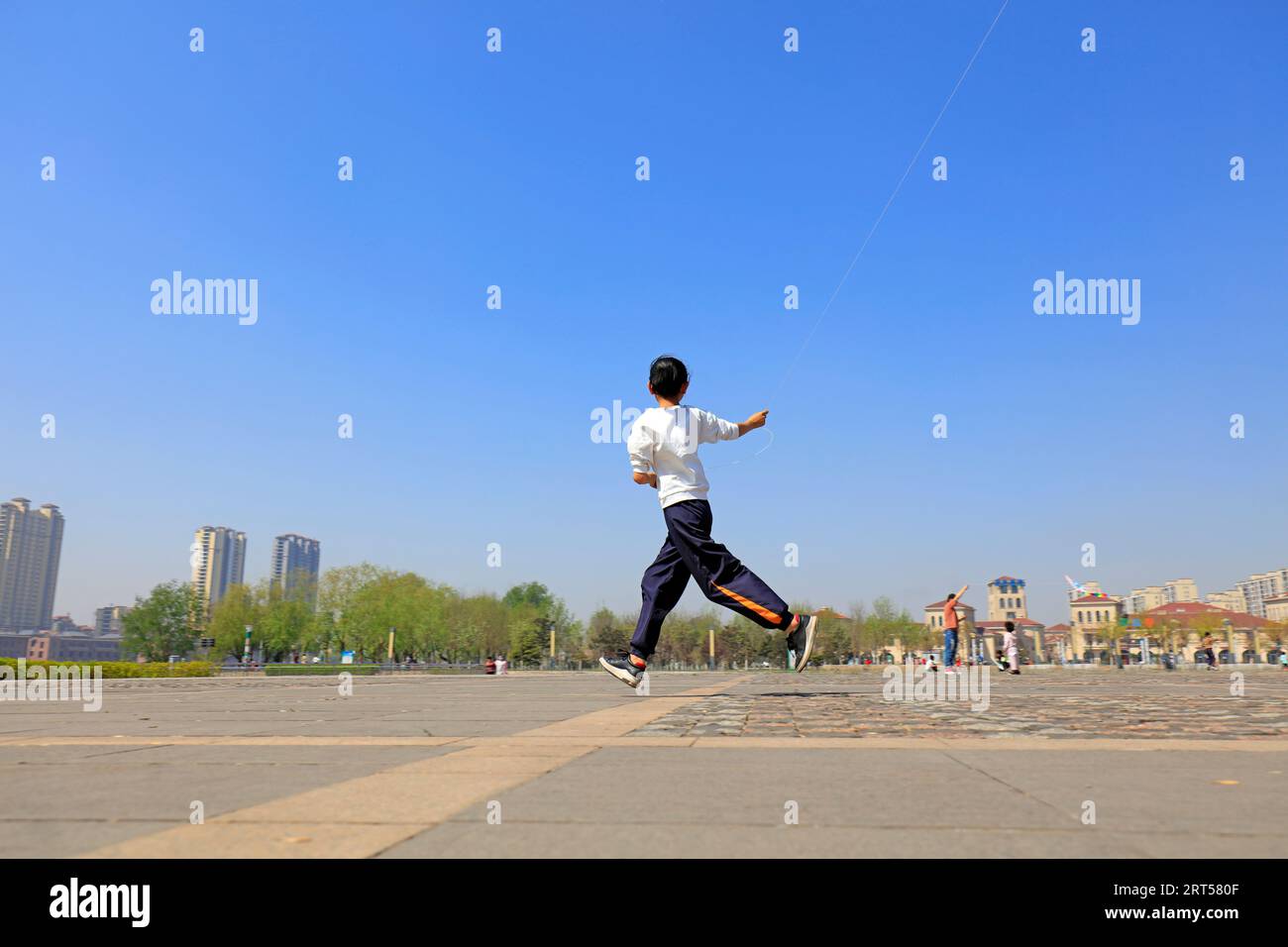 Asian people flying kite hi-res stock photography and images - Alamy