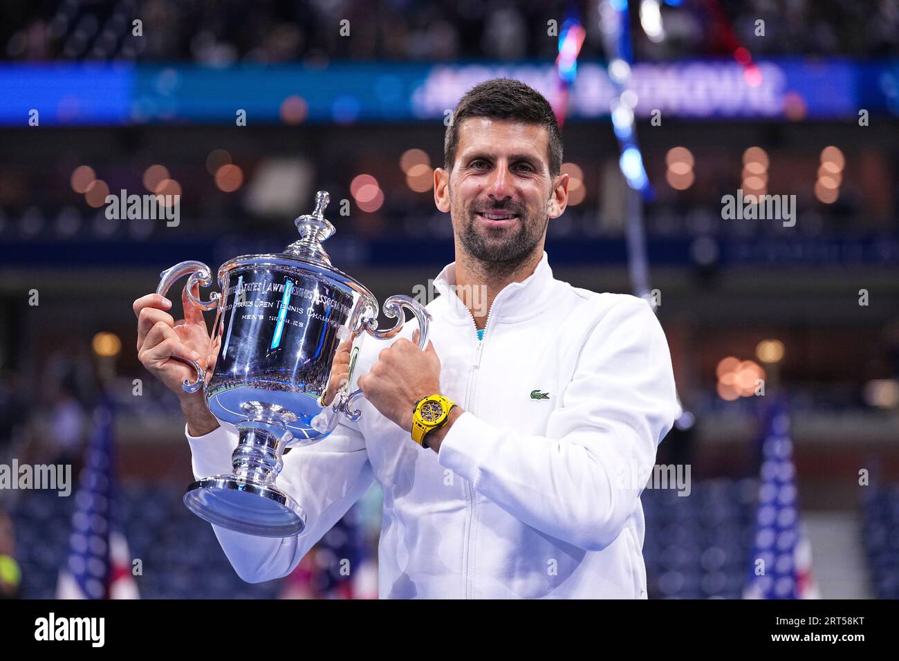 Novak Djokovic holds the trophy after winning a men's singles ...