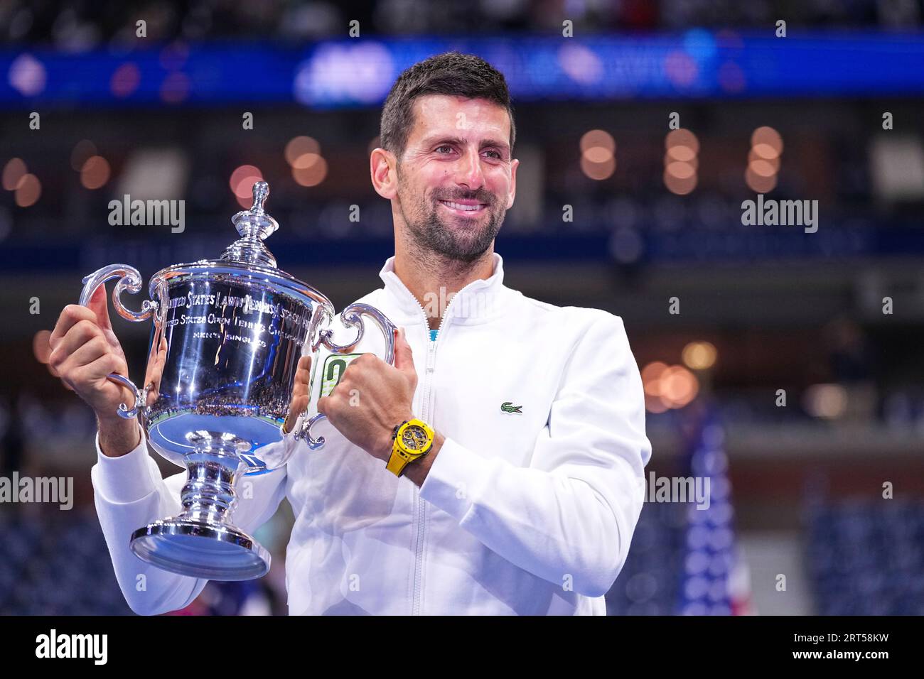 Novak Djokovic holds the trophy after winning a men's singles ...