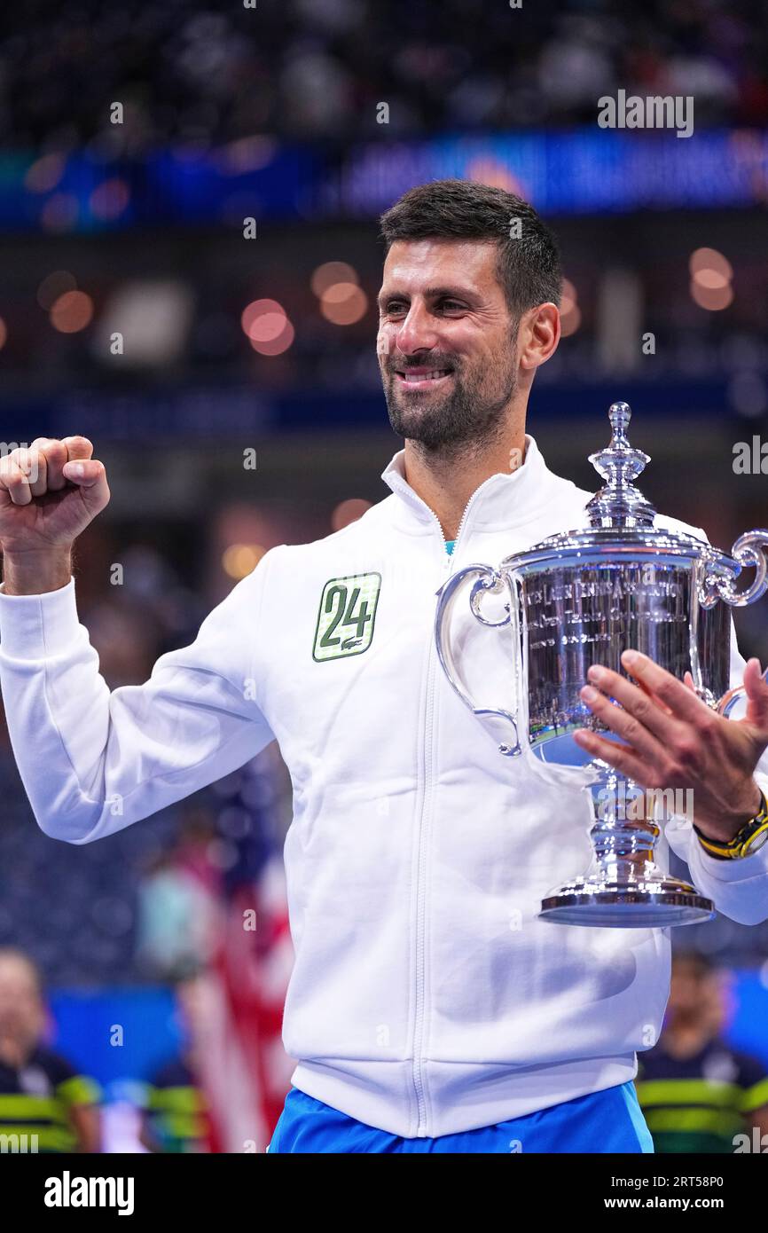 Novak Djokovic holds the trophy after winning a men's singles ...