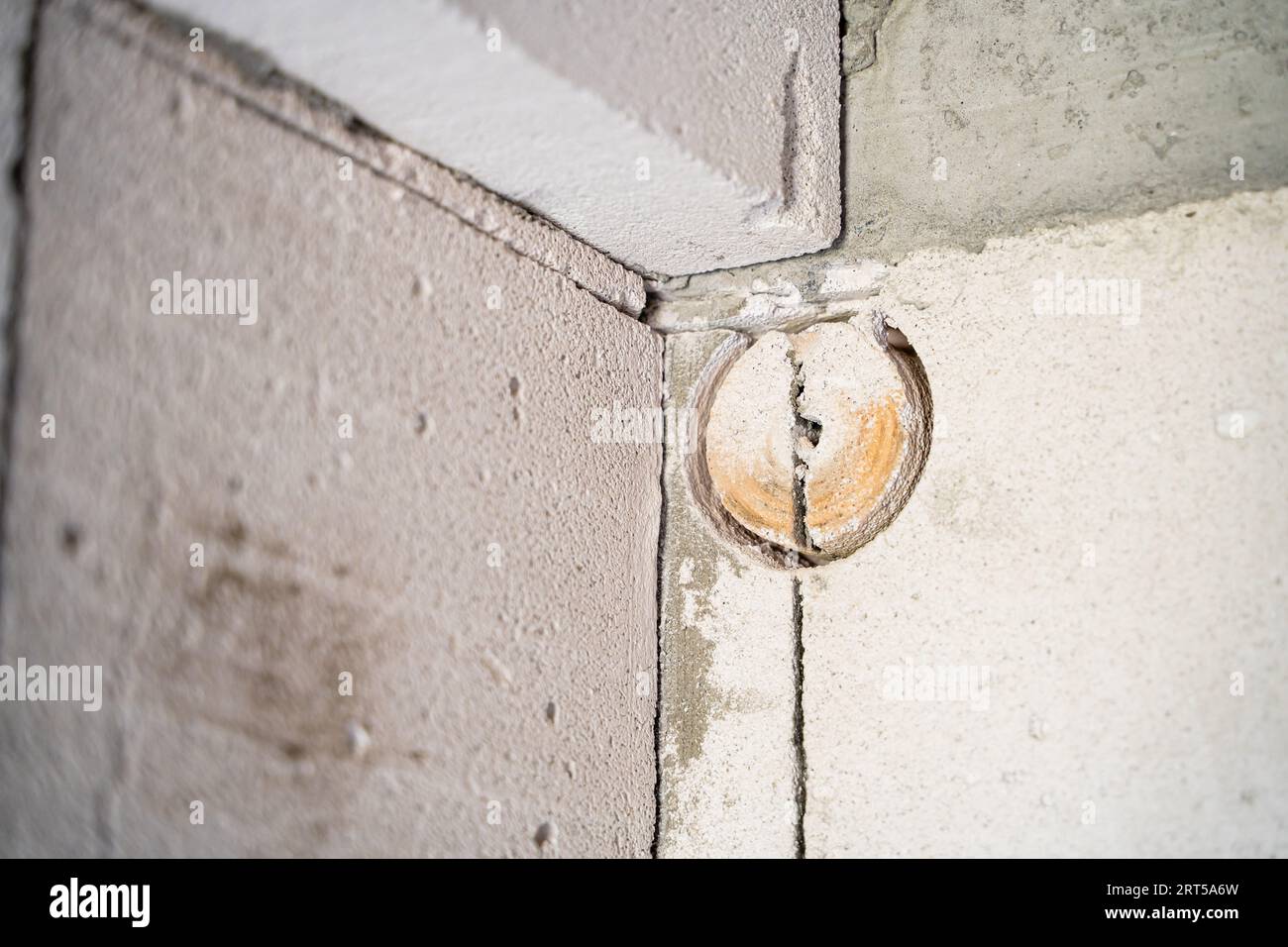 Cutting out a place for wiring and a socket in a wall of aerated ...