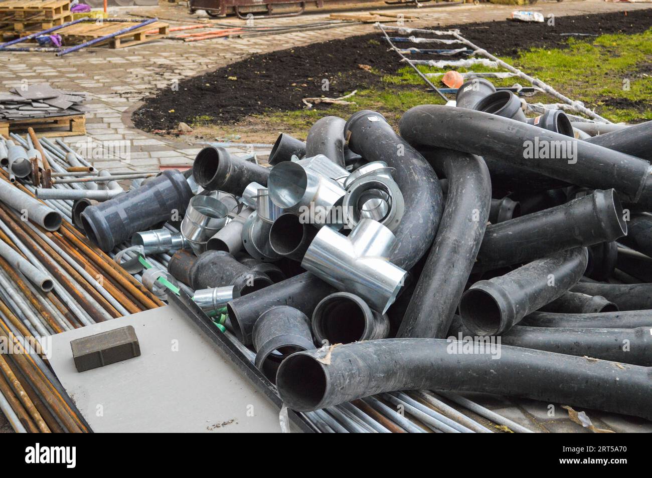 Large black plastic sewer plumbing pipes for the construction of water ...