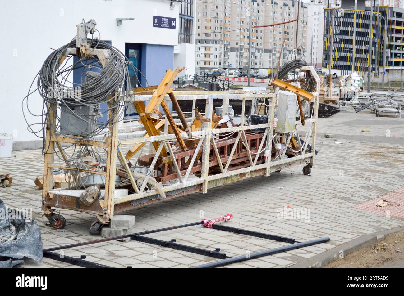 Large iron metal building facade elevator cradle for lifting workers ...