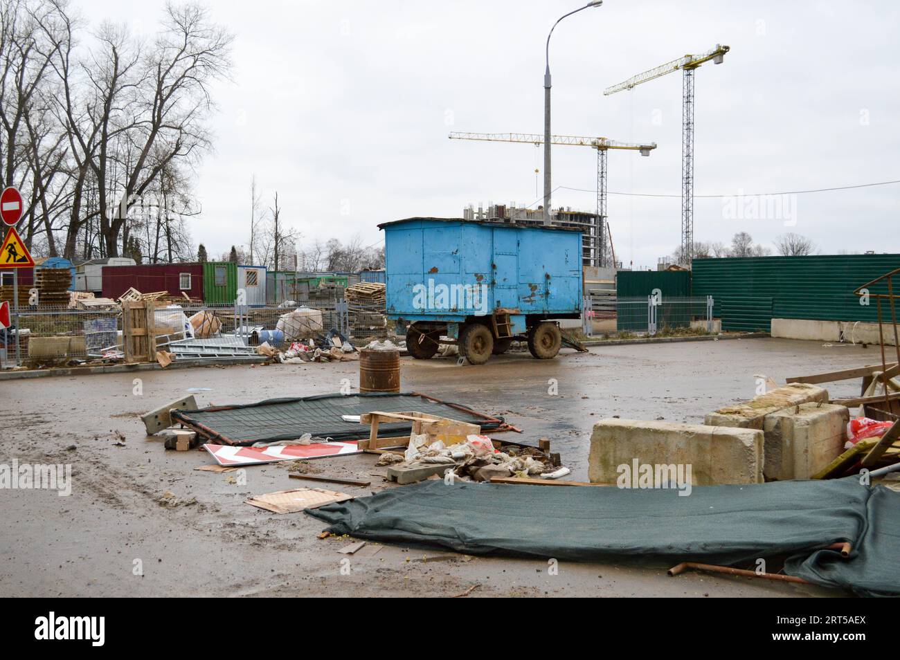 Small temporary houses of builders from containers at an industrial ...