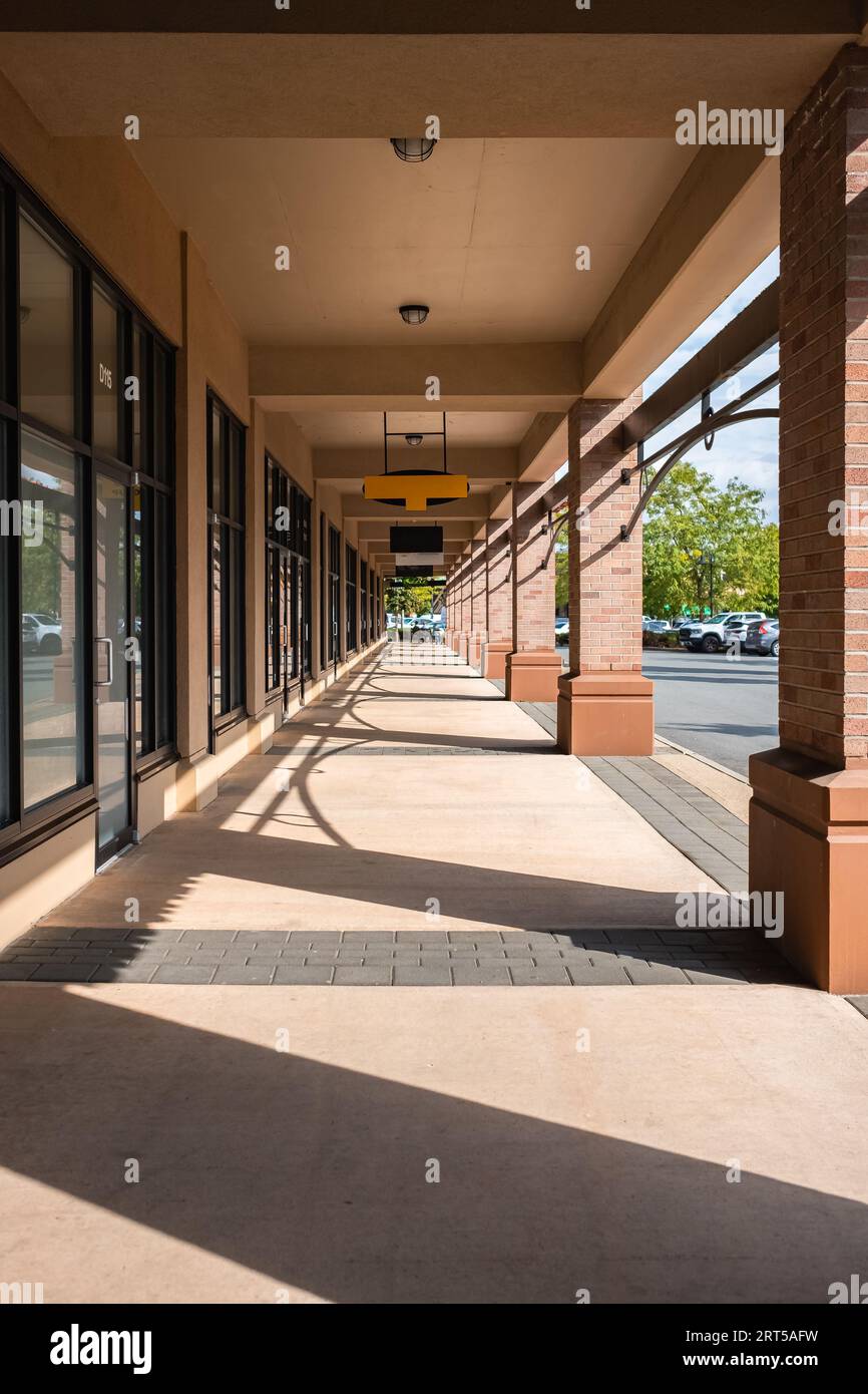 Building pillars outside corridor and glass doors. Corridor of brick ...