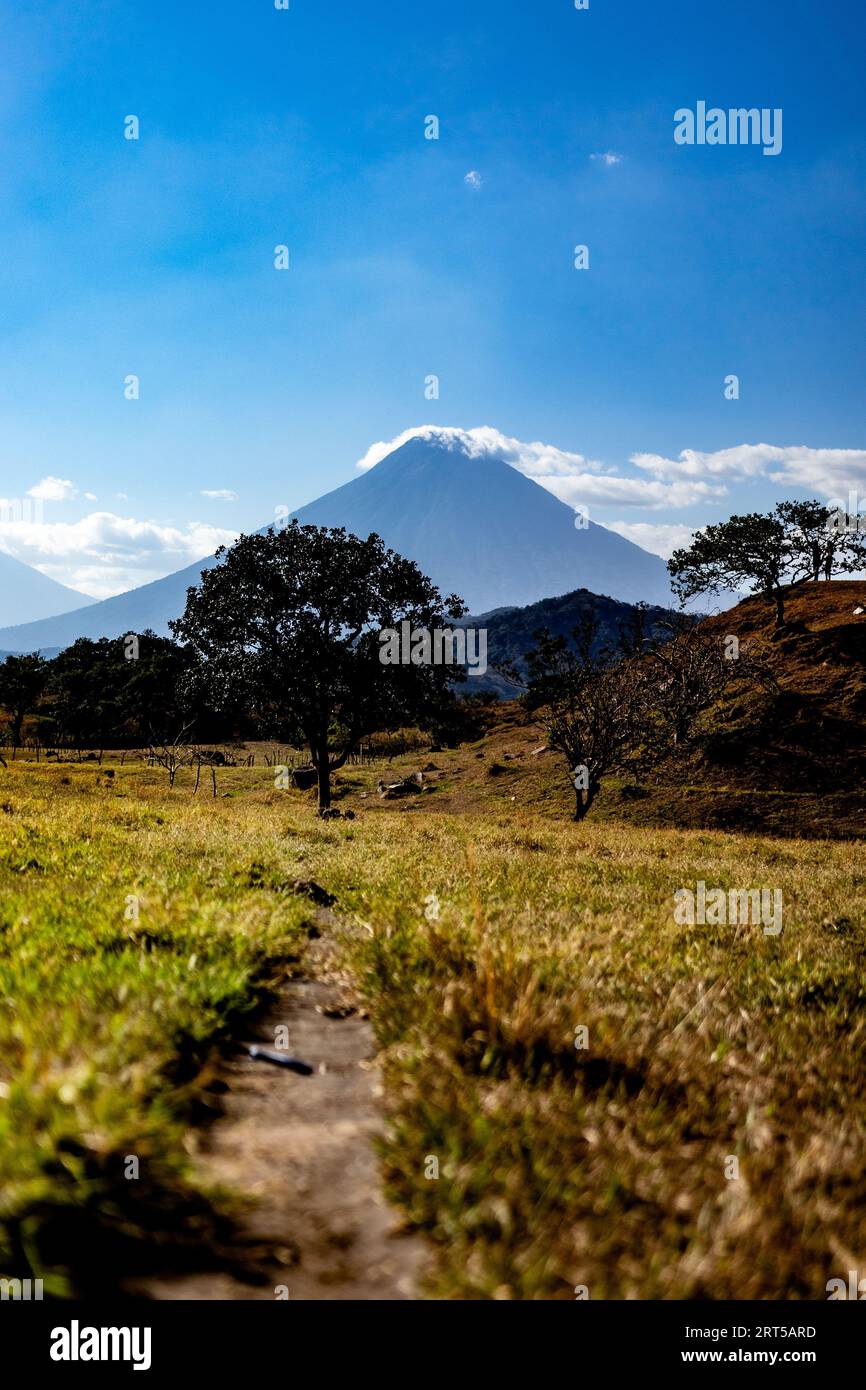 Grassy field with volcano hi-res stock photography and images - Alamy