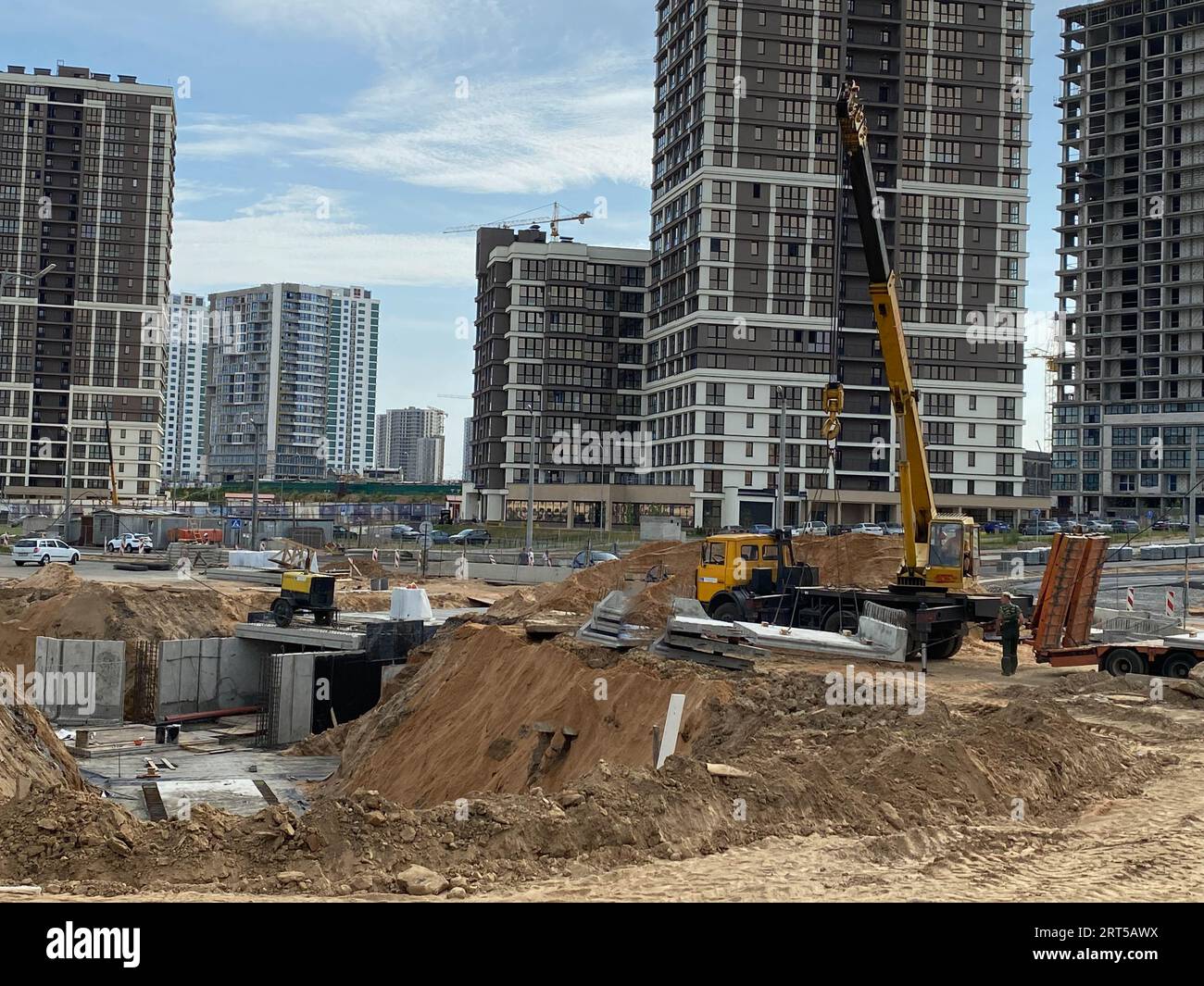 Tall modern beautiful buildings and houses are concrete skyscrapers ...