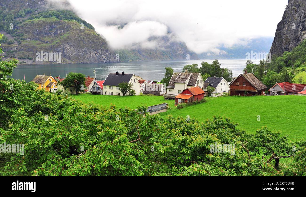 Traditional scandinavian houses of Undredal village on lake, Norway ...