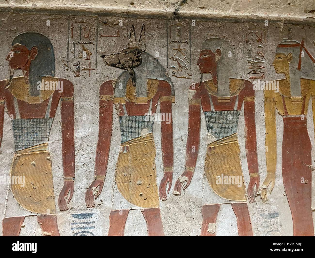 A closeup of ancient Egyptian frescos on the walls in a temple in Luxor ...