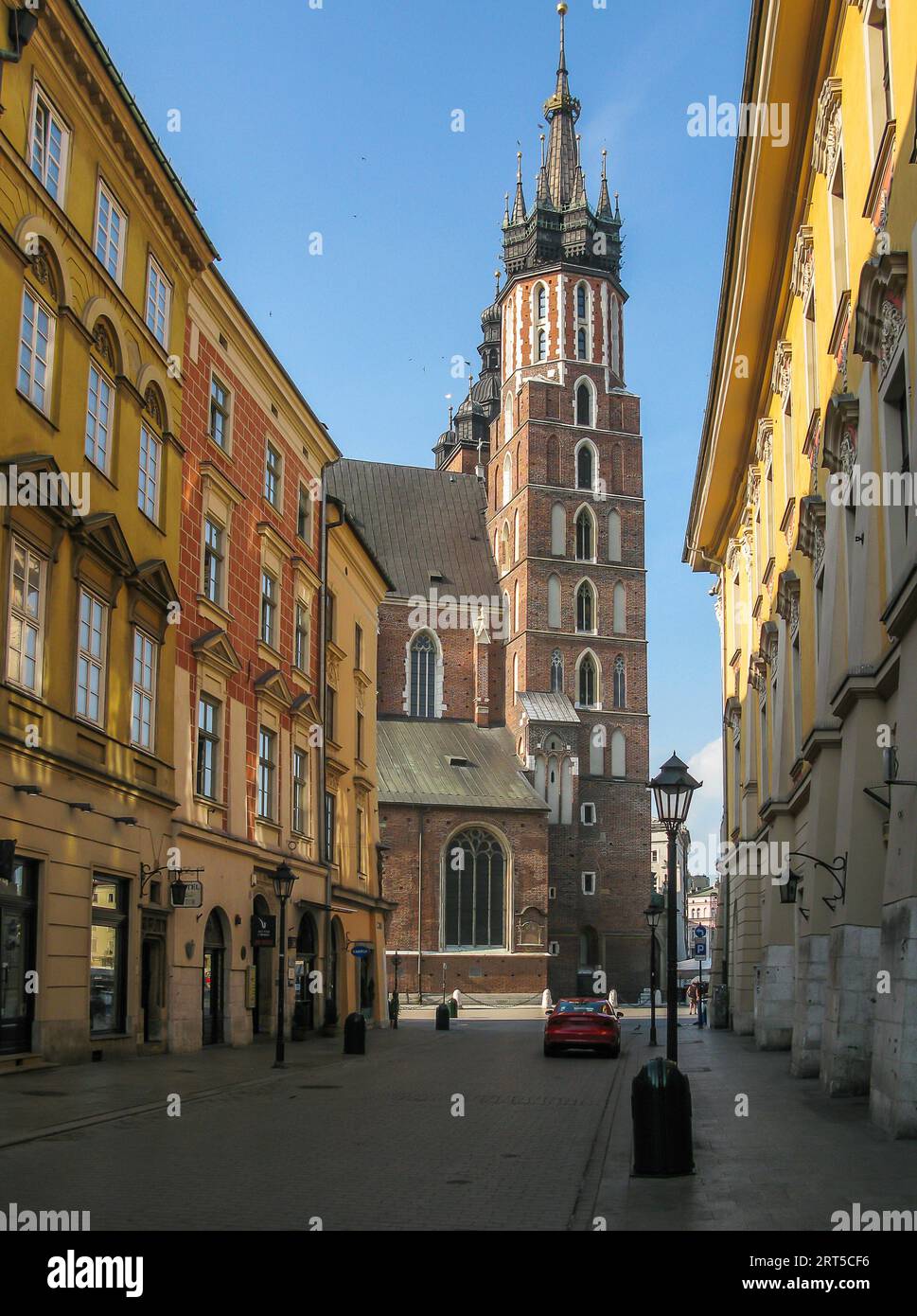 view of Florianska street and towers of St. Mary's Basilica, Krakow ...