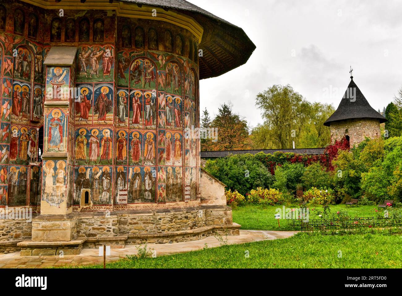 Photo of the painted frescoes and the outter wall of the Moldovița ...