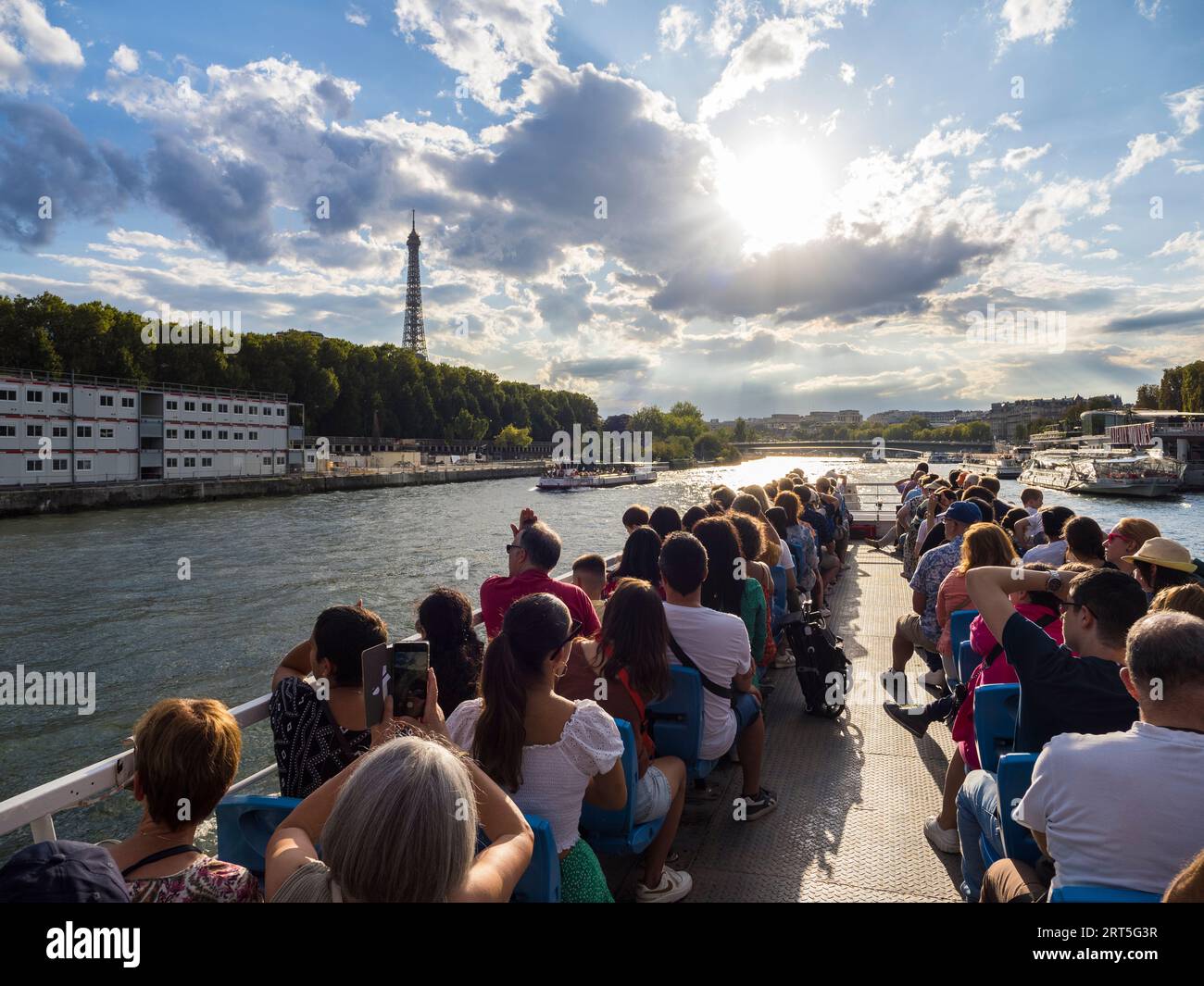 Tourists on River Cruse Boat, view of Eiffel Tower, River Seine, Paris ...