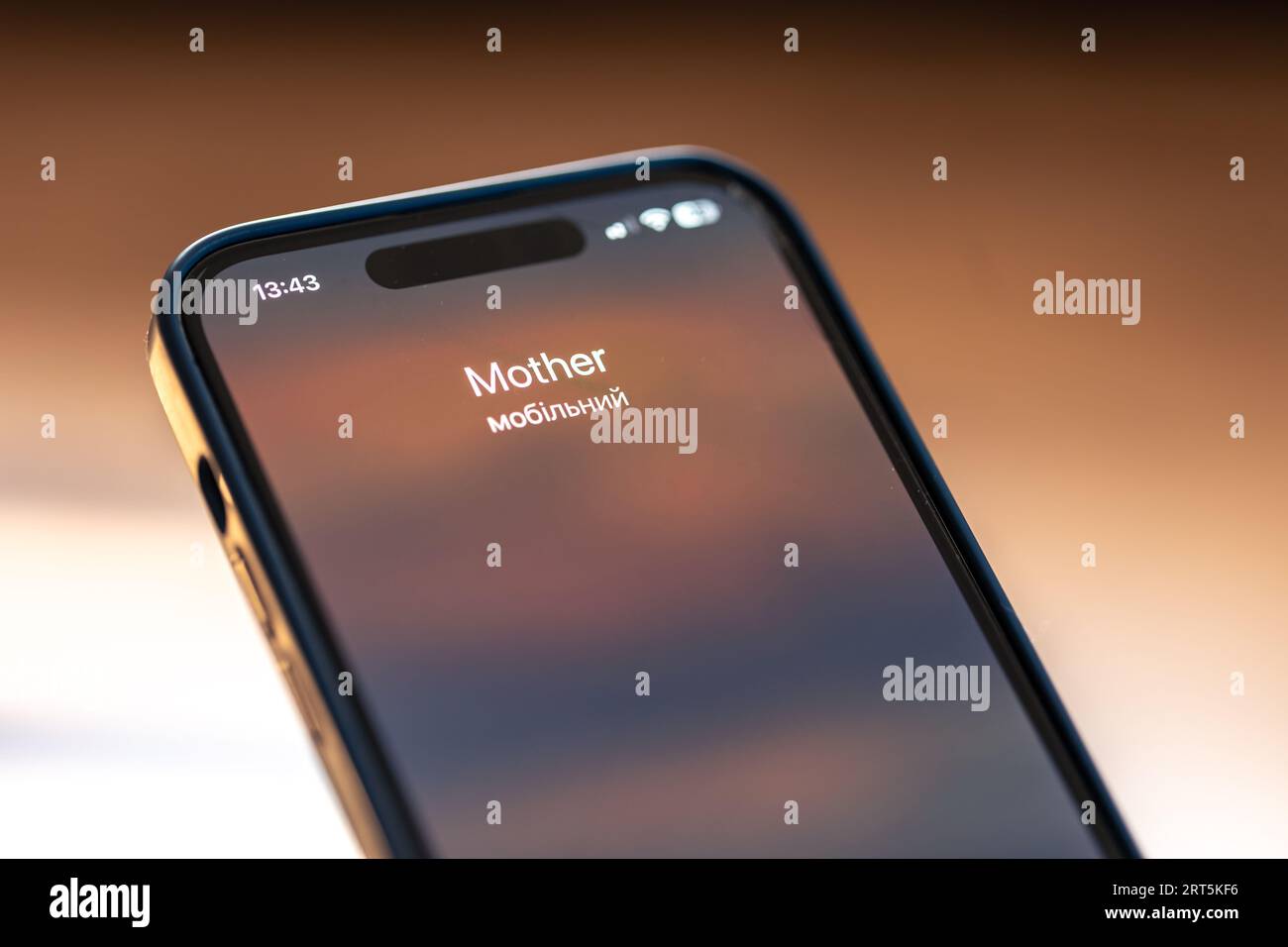 Smartphone in child hands with Incoming Mother call on a screen Stock ...