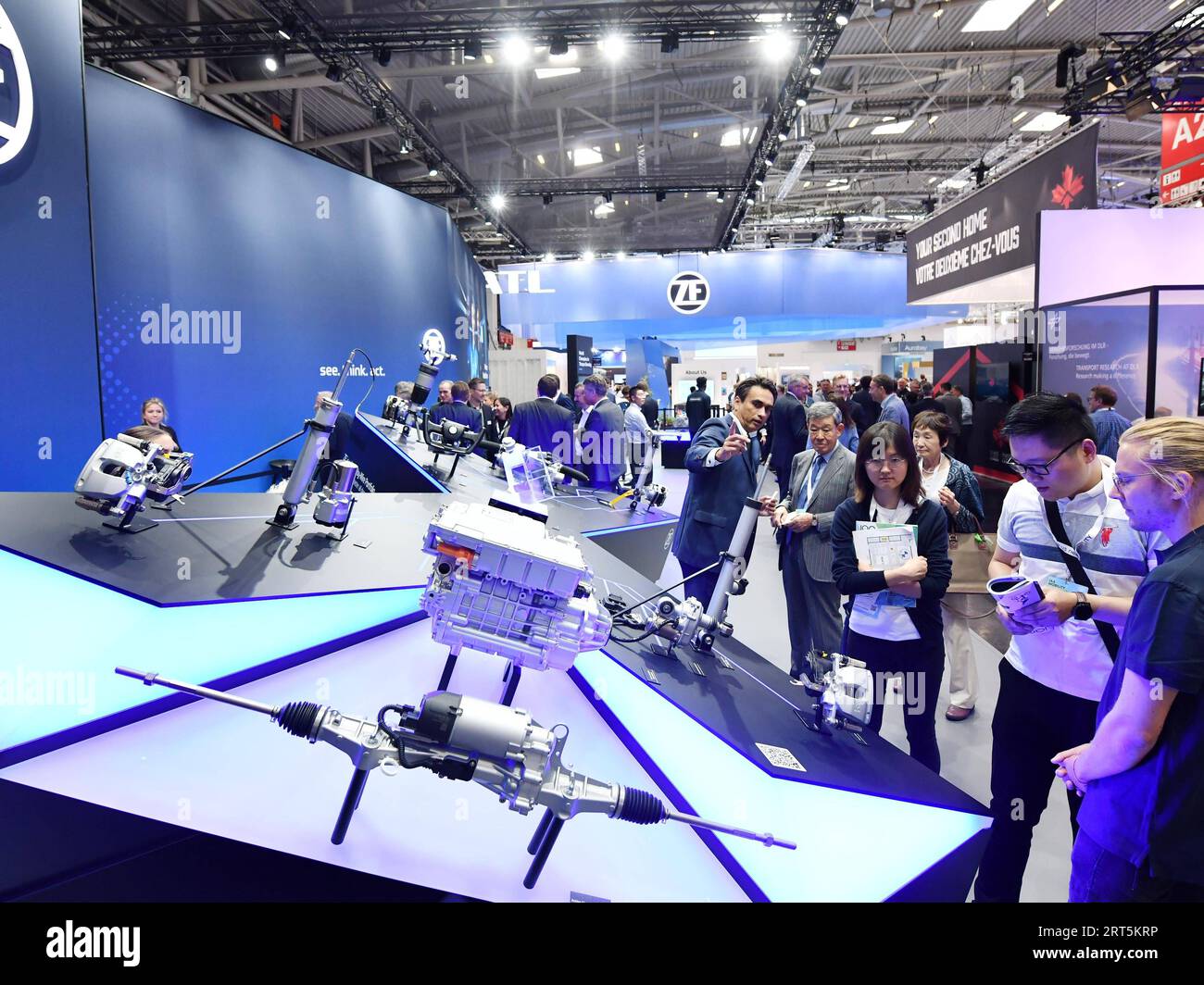 230905 -- MUNICH, Sept. 5, 2023 -- People visit the booth of ZF during ...