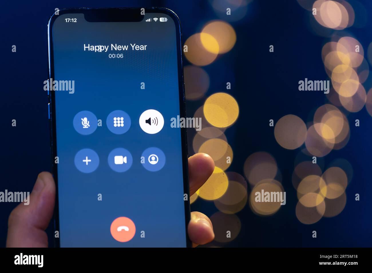 Incoming call screen from Happy New Year, close up Stock Photo - Alamy