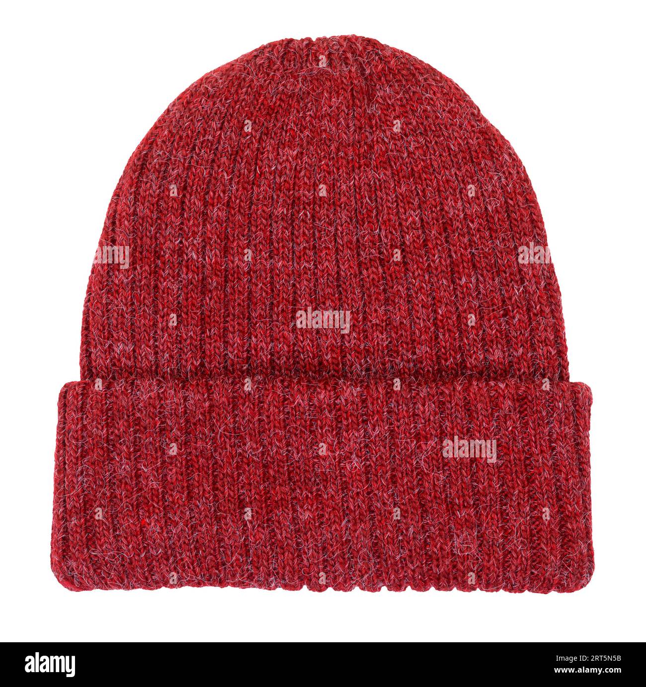Red knitted winter bobble hat of traditional design isolated on white ...