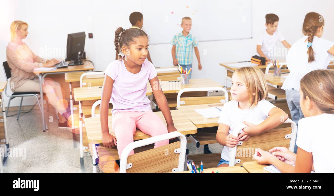 Children pupils talking during recess between lessons Stock Photo - Alamy