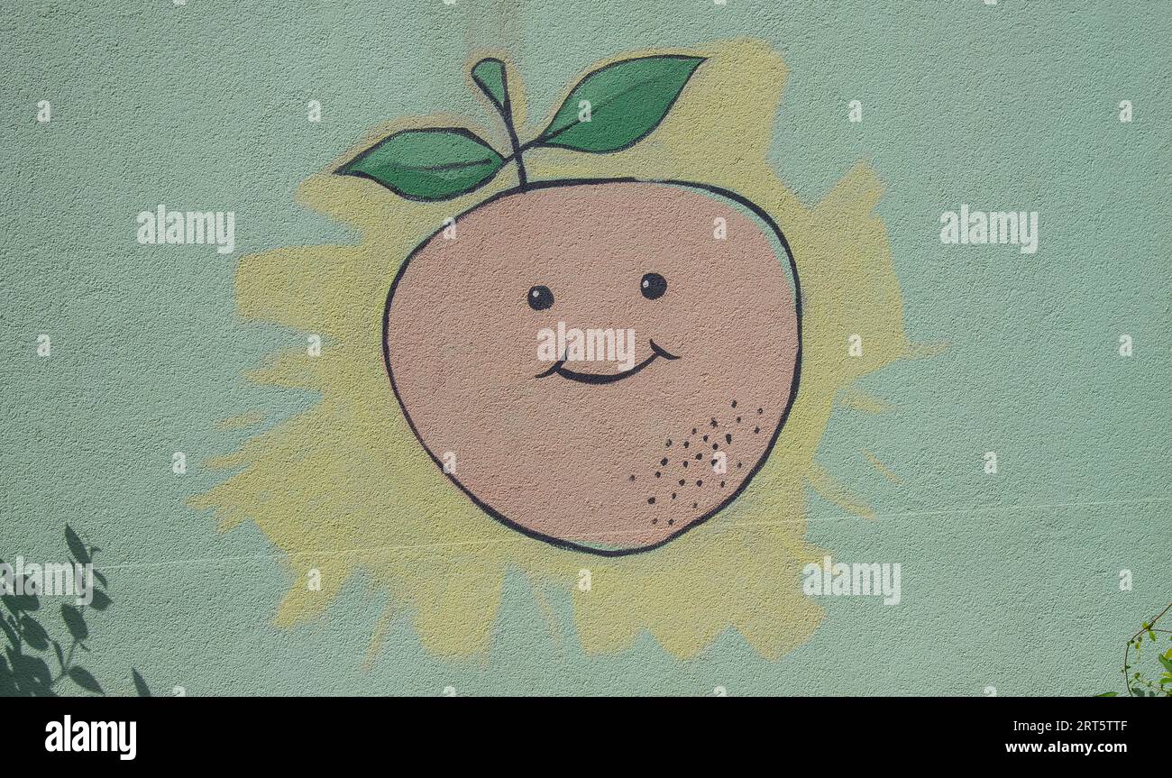 The painted wall in the building of the kindergarten. The color ...