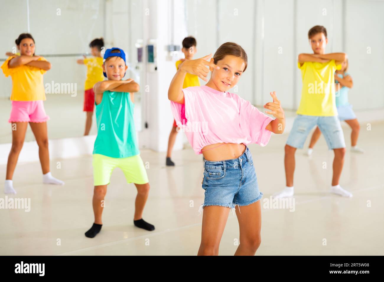 Active children dancing modern dances in choreographic studio Stock ...